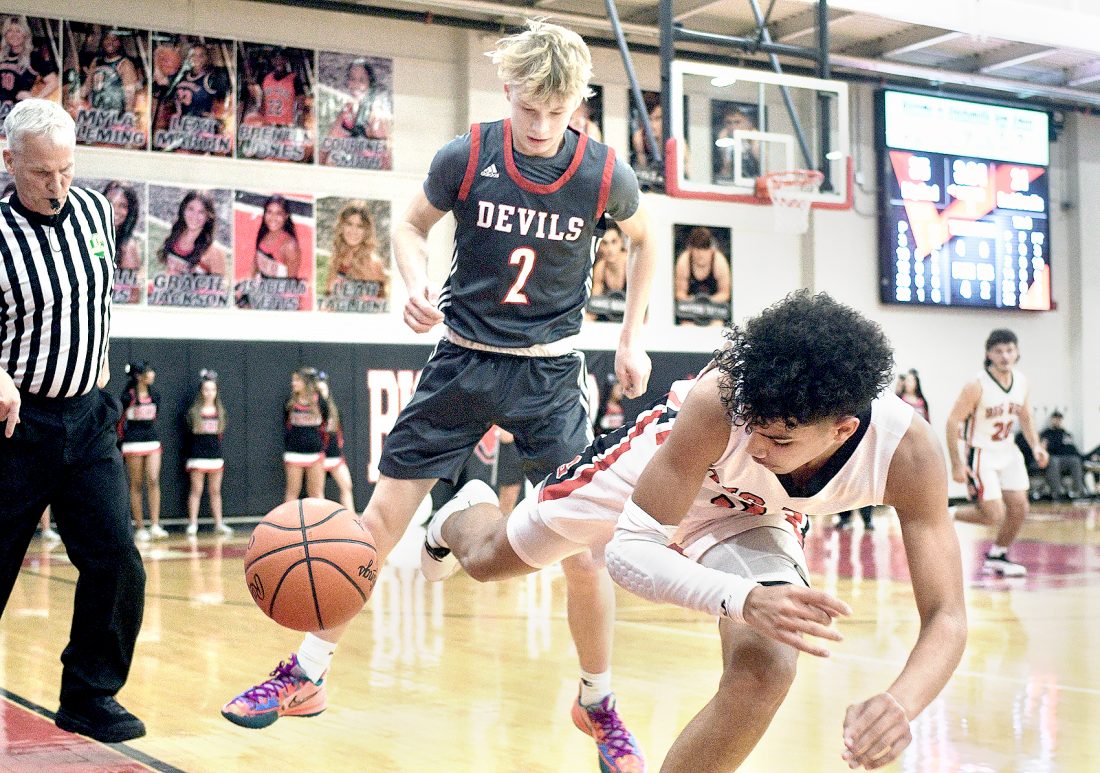 Big Red boys basketball wins impressively over St. Clairsville at home ...